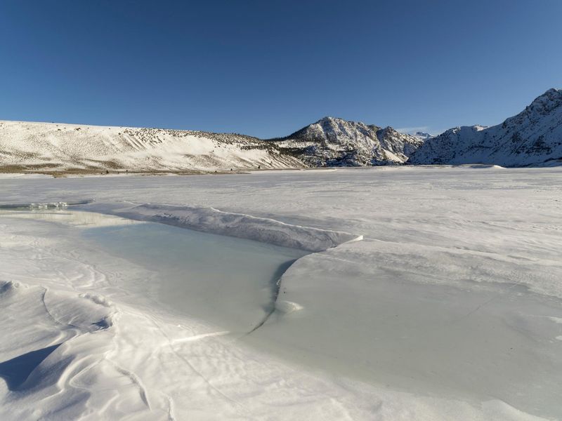 Mountain Side Frozen Lake in Snow on Sunny Day HDRi Maps and Backplates