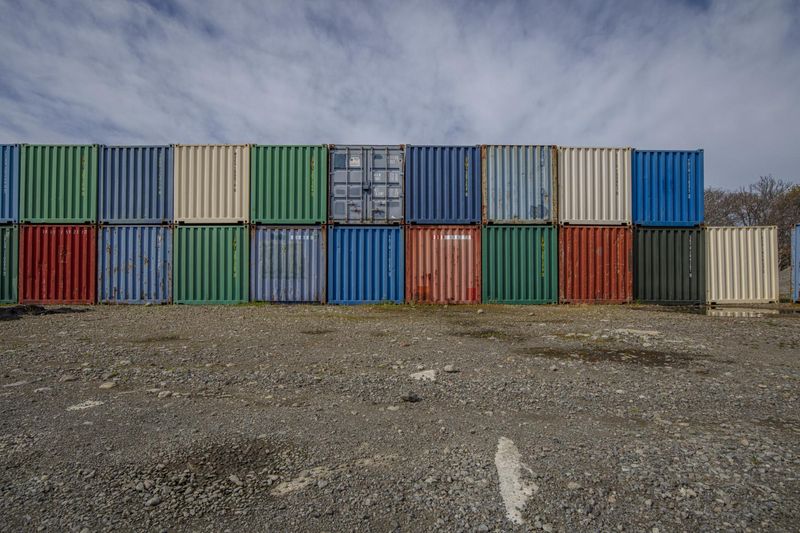 Multicolored Containers Against a Cloudy Blue Sky HDRi Maps and Backplates