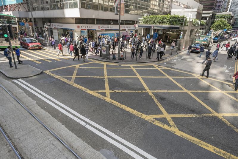 People Crossing the Street in a Busy City Intersection with Tram HDRi ...
