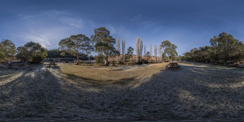 A Picturesque Landscape: Vehicles on a Grassy Field with Trees HDRi ...