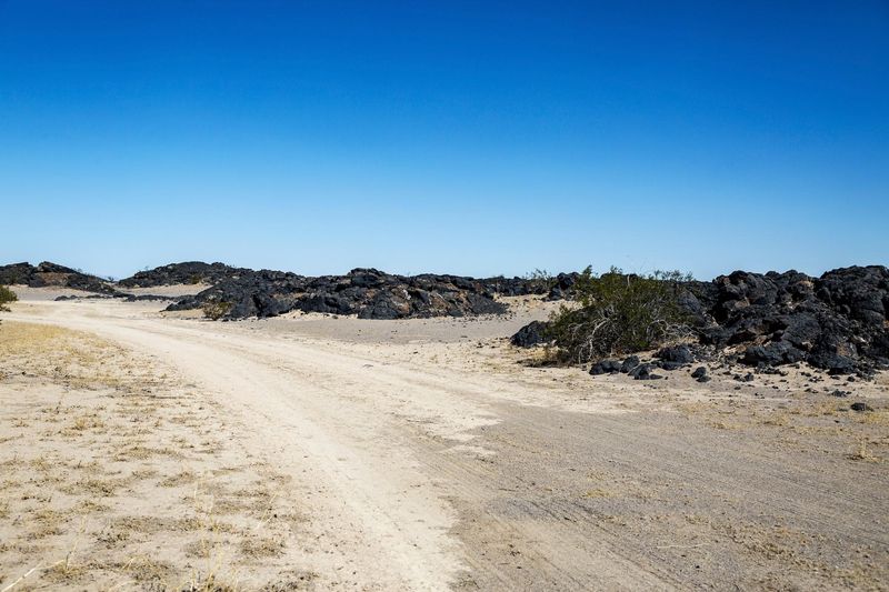 Road Through Rugged Desert Landscape HDRi Maps and Backplates