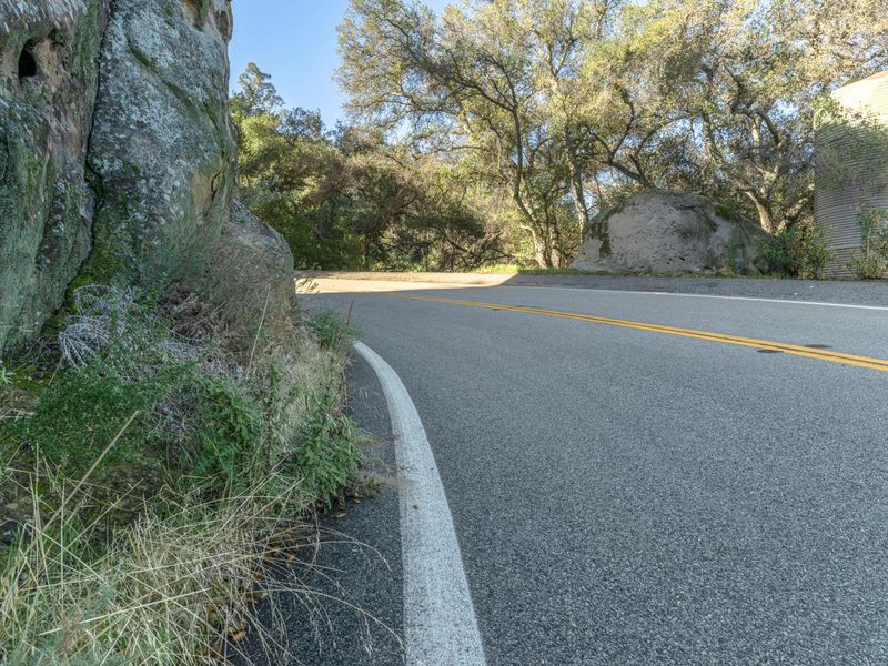 Rural Mountain Road with Winding Path HDRi Maps and Backplates