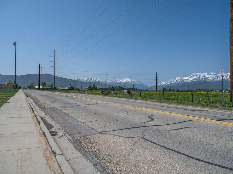 Rural Utah: A Snow-Covered Road Amidst a Majestic Mountain Landscape ...