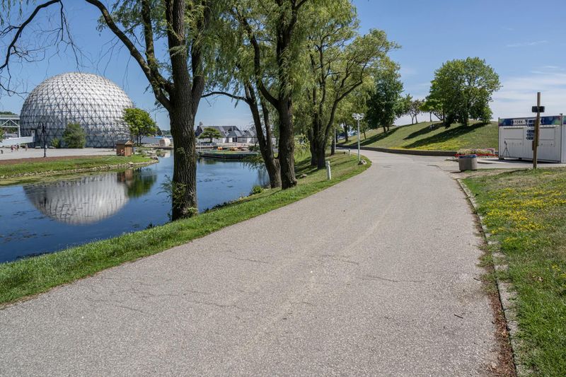 Scenic Paved Road Next to River and Modern Architecture in Toronto ...