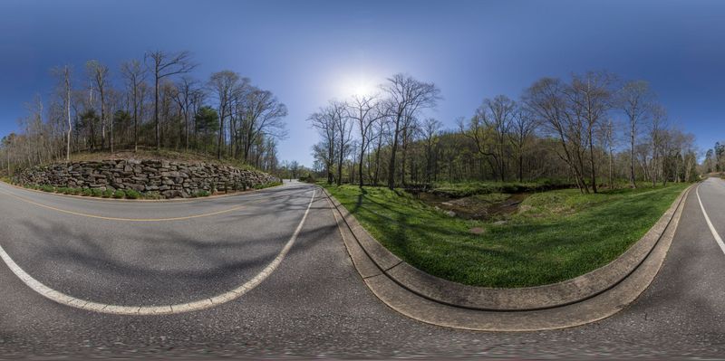 Scenic Rural Road with a Grassy Shoulder HDRi Maps and Backplates