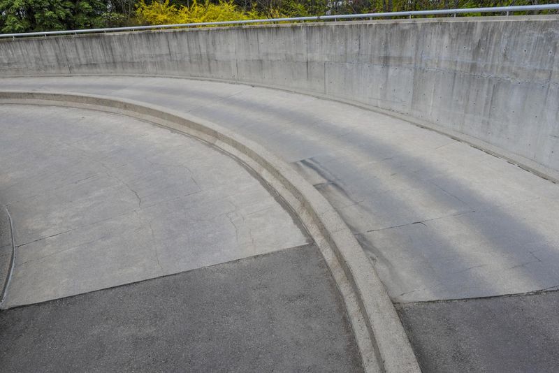 Skateboarding on Concrete Ramp by the River in Toronto, Canada