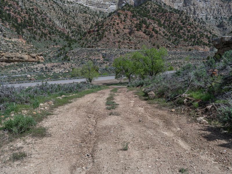 A Straight Road in Utah: Embracing the Mountain Landscape on a Clear ...