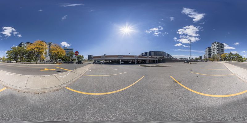 Urban Design in Toronto: A Parking Lot with Buildings in the Background ...