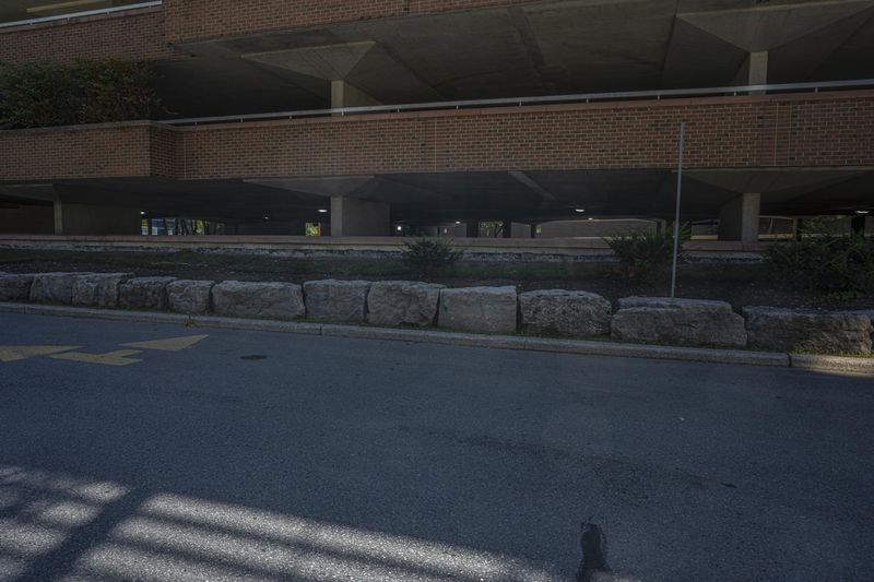 Urban Design in Toronto: Street Corner with Parking Garage and Bench ...