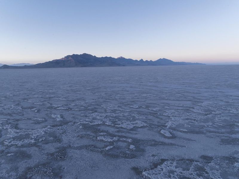 Utah Dawn: Rugged Salt Lake City Landscape with Mountains and Clear Sky ...