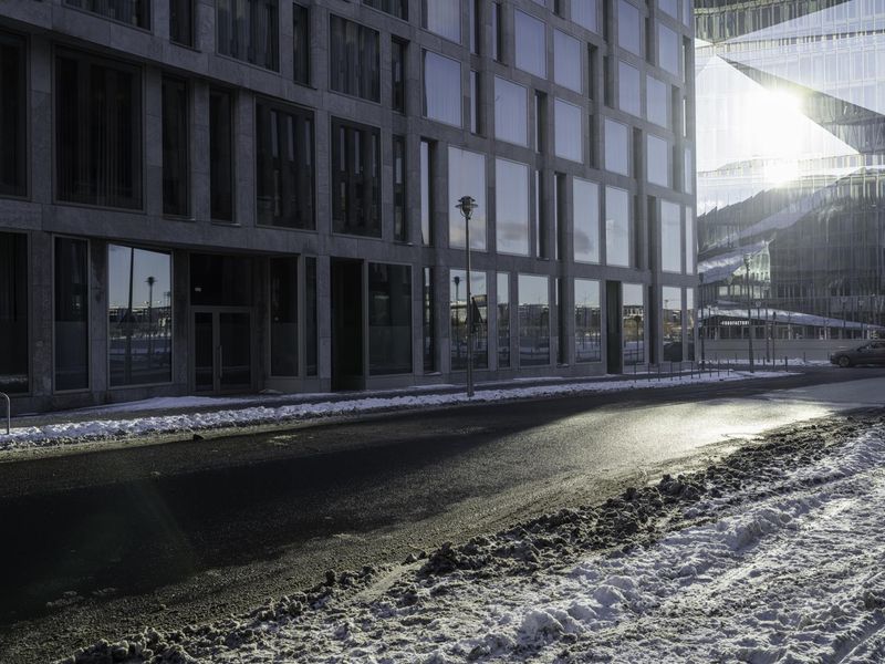 Winter Cityscape with Snow-Covered Buildings HDRi Maps and Backplates