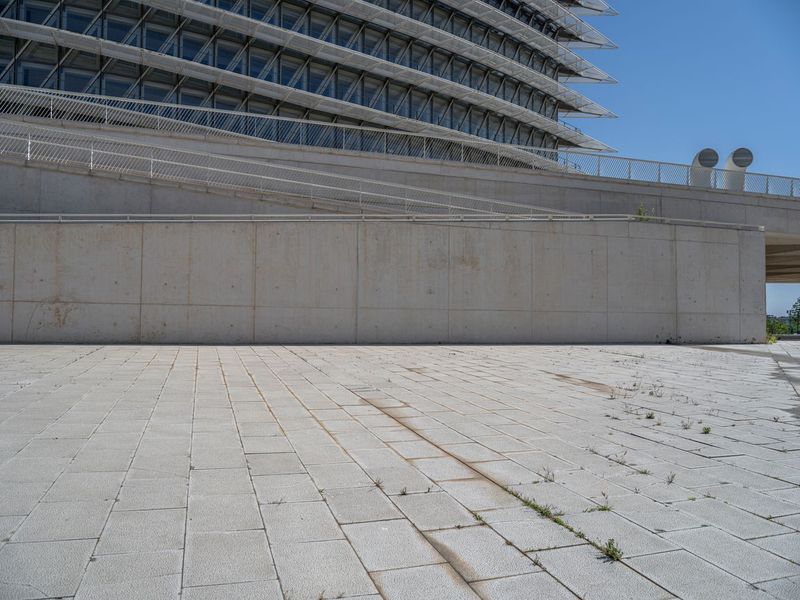 Zaragoza: A Concrete Wall with a Paver Surface HDRi Maps and Backplates